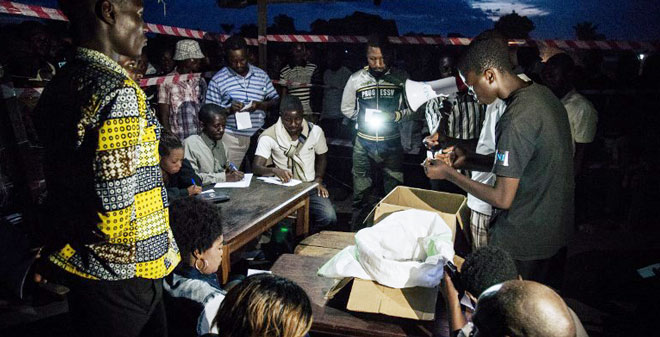 Voting winds up in volatile DRC's long-awaited election